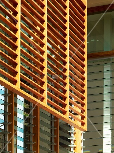 Wooden louvers in front of a house … – Buy image – 11001106 living4media